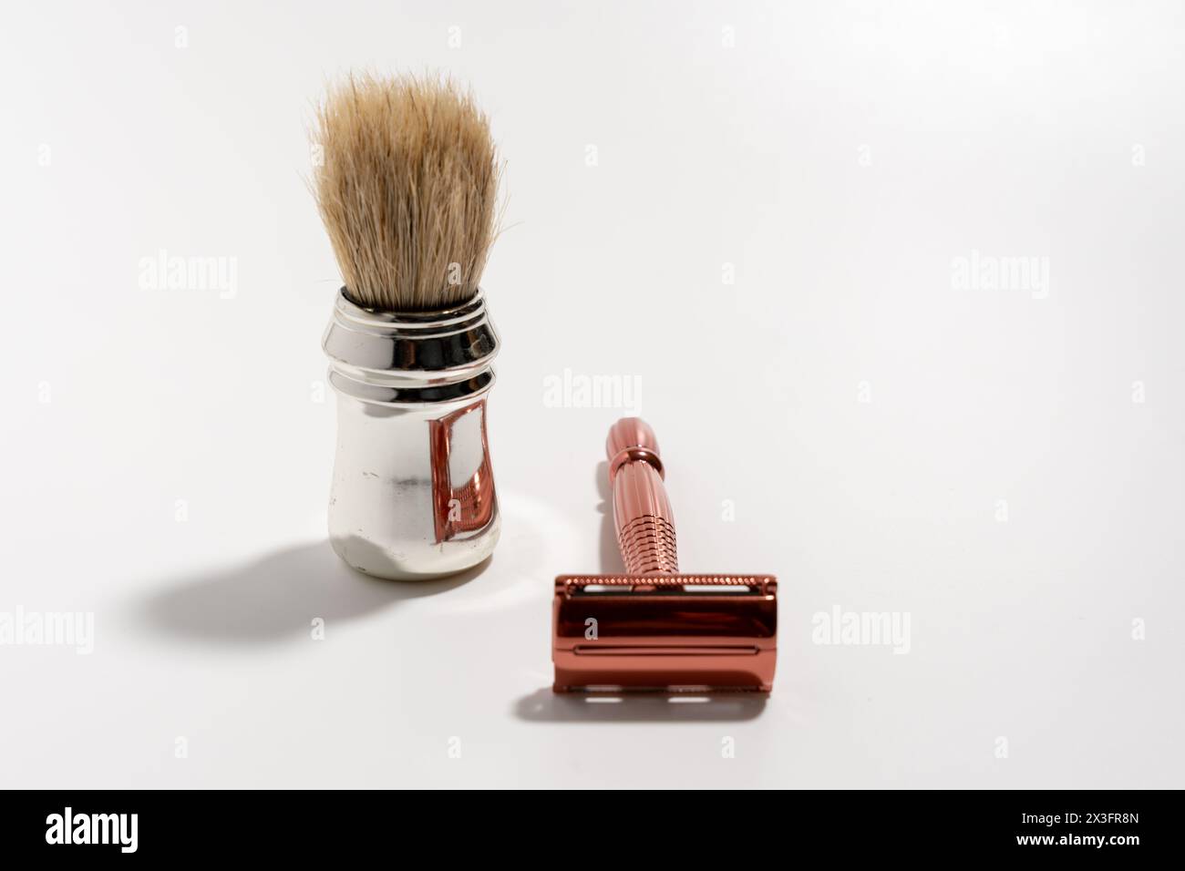 Metal razor and pen brush on a white background. Razor close-up Stock ...