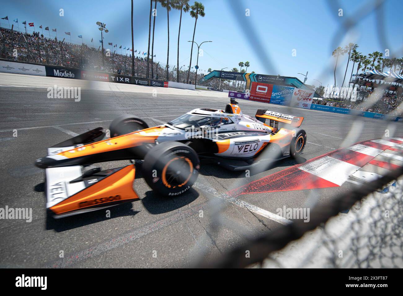 Alexander Rossi passes by as he nears the final hair-pin turn before ...