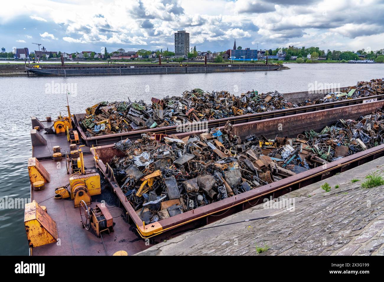 Barges loaded with scrap metal, for recycling, melting down, in the ...