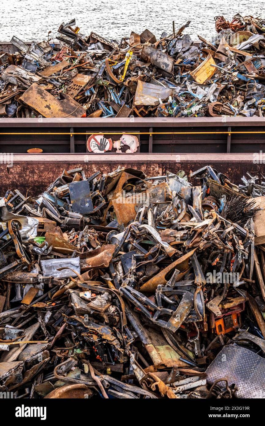 Barges loaded with scrap metal, for recycling, melting down, in the ...