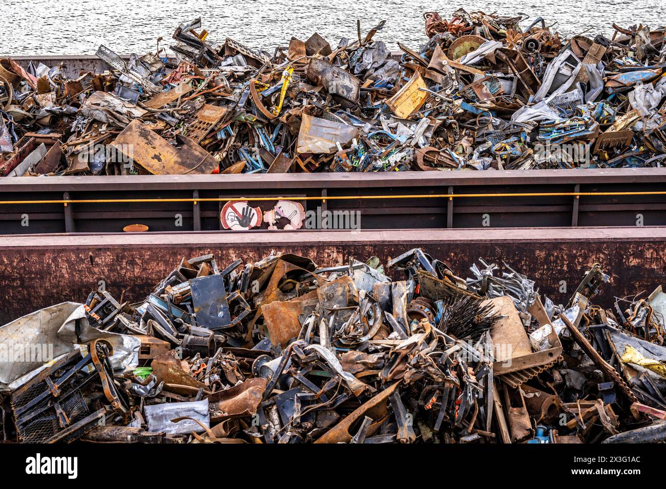 Barges loaded with scrap metal, for recycling, melting down, in the ...
