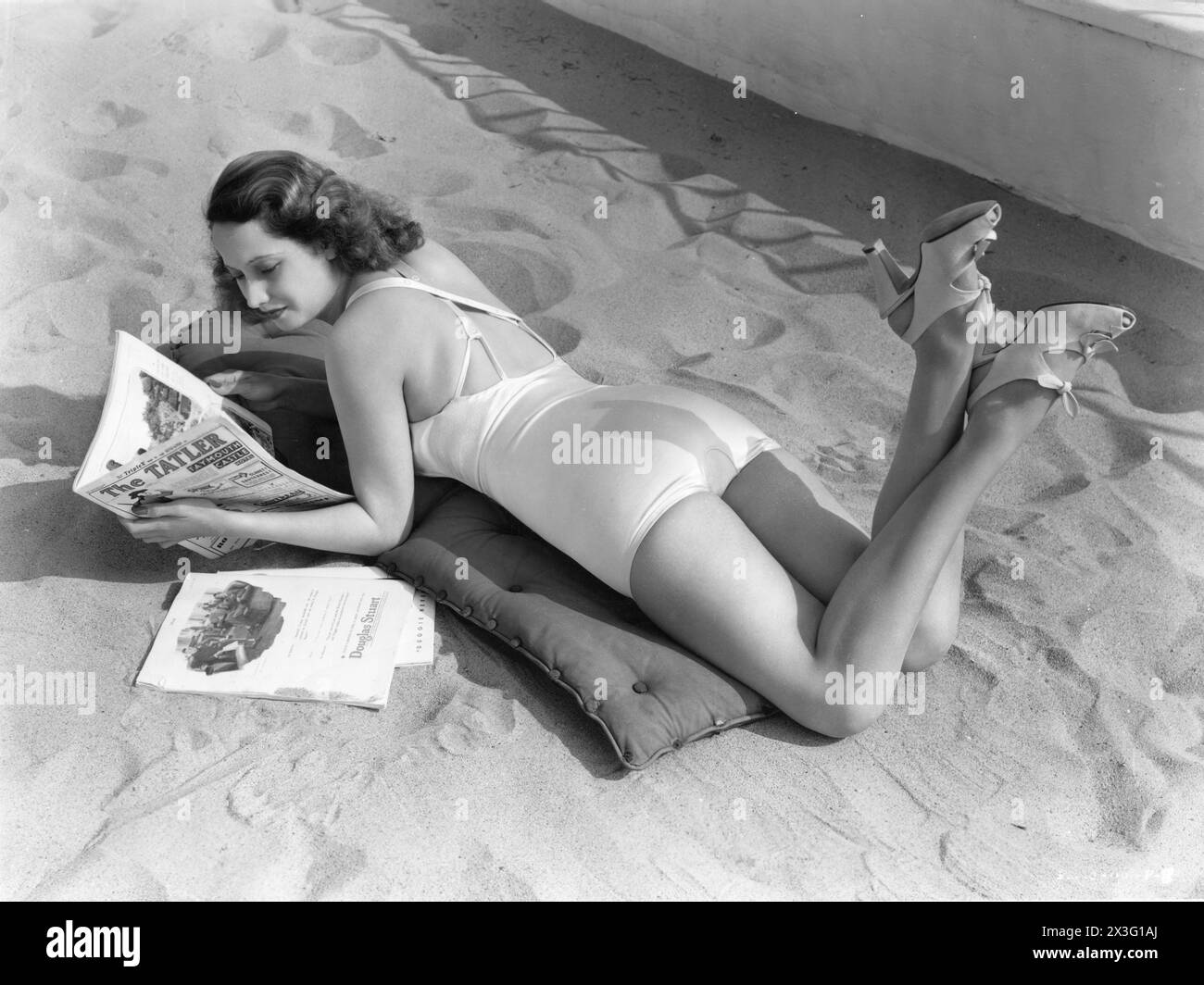 Publicity Portrait of Indian-born British Actress MERLE OBERON taken in 1938 sunbathing on the ...