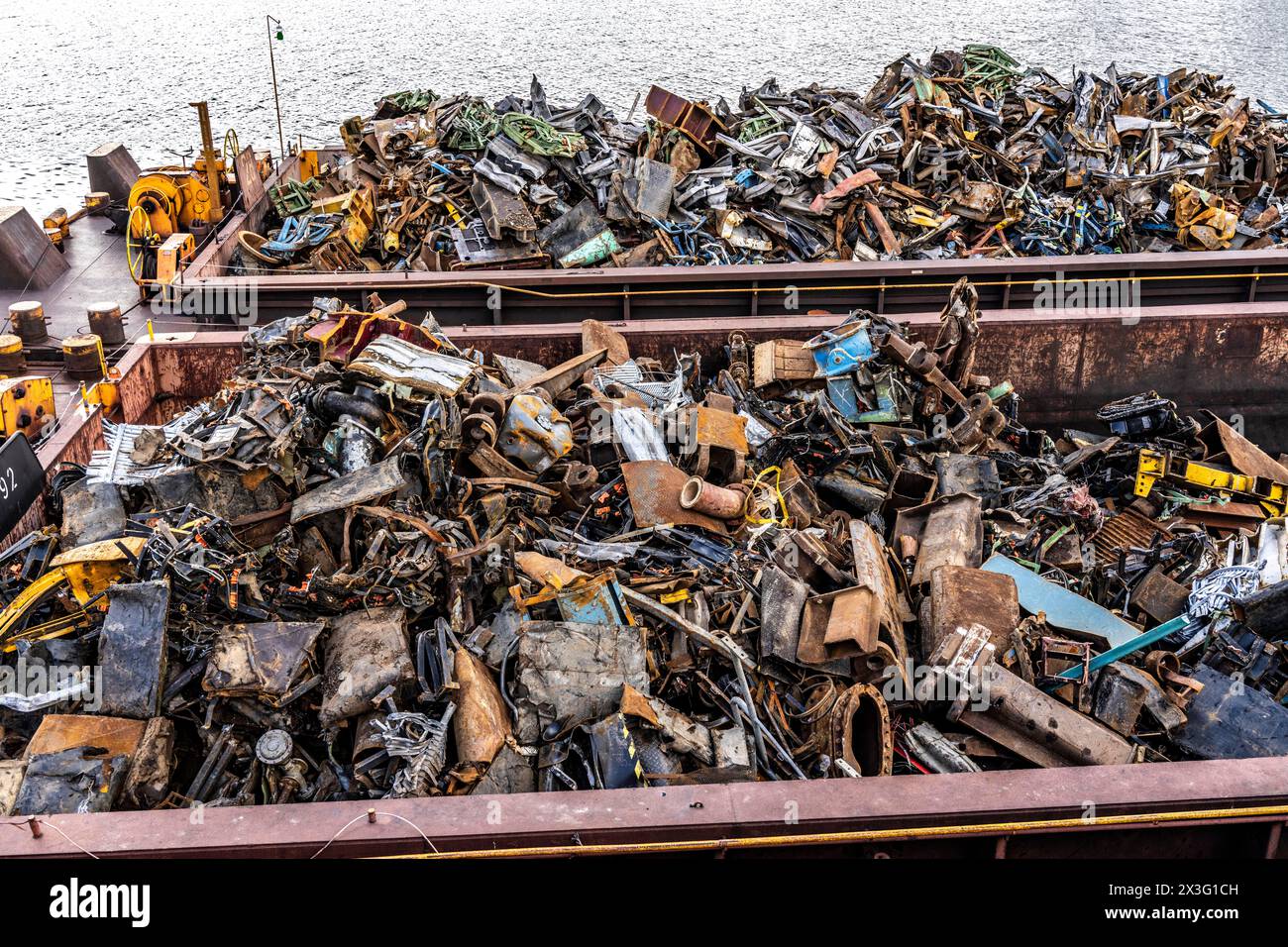 Barges loaded with scrap metal, for recycling, melting down, in the ...
