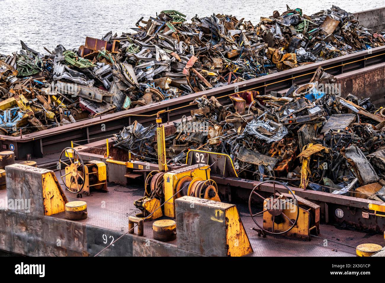 Barges loaded with scrap metal, for recycling, melting down, in the ...