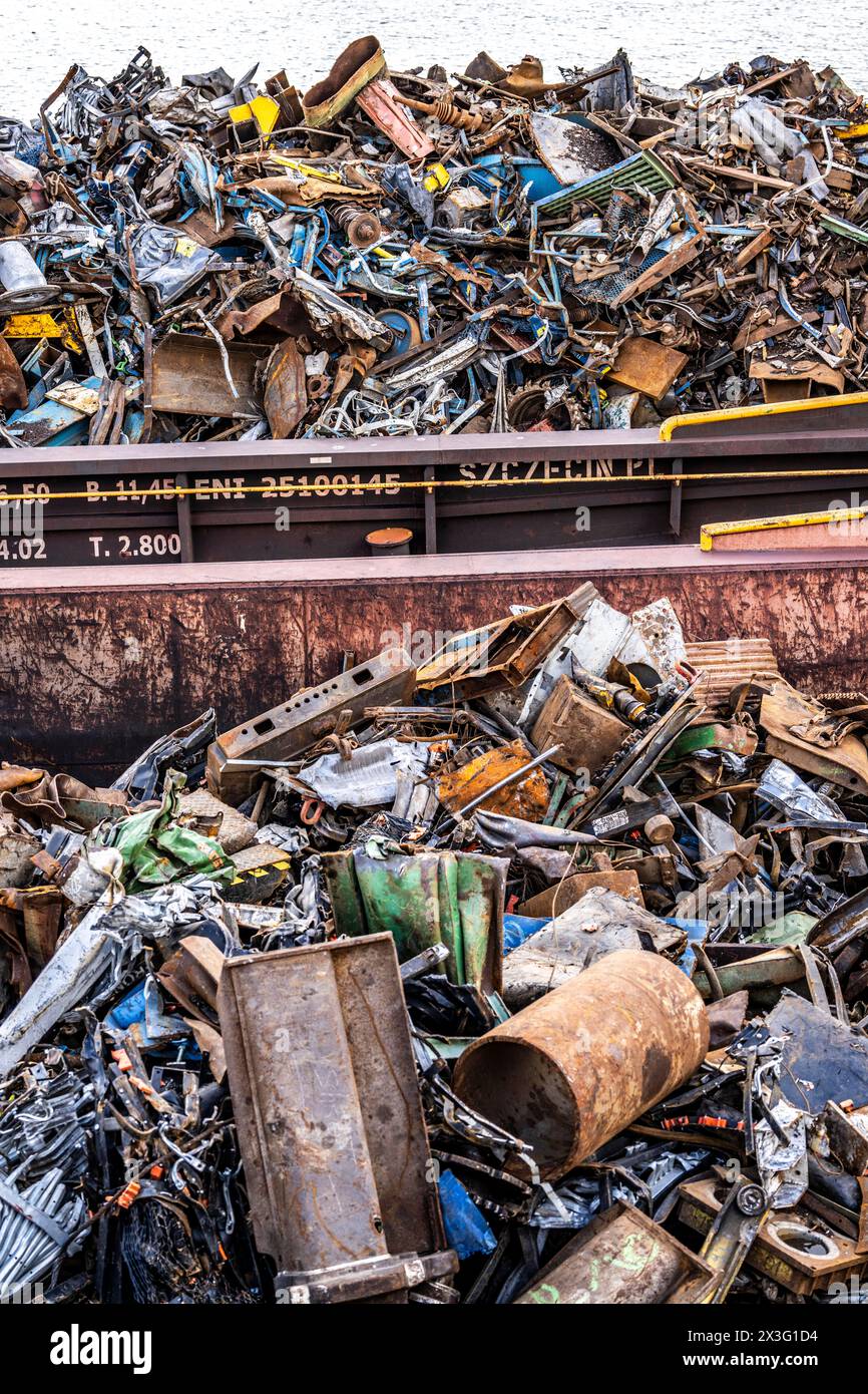 Barges loaded with scrap metal, for recycling, melting down, in the ...