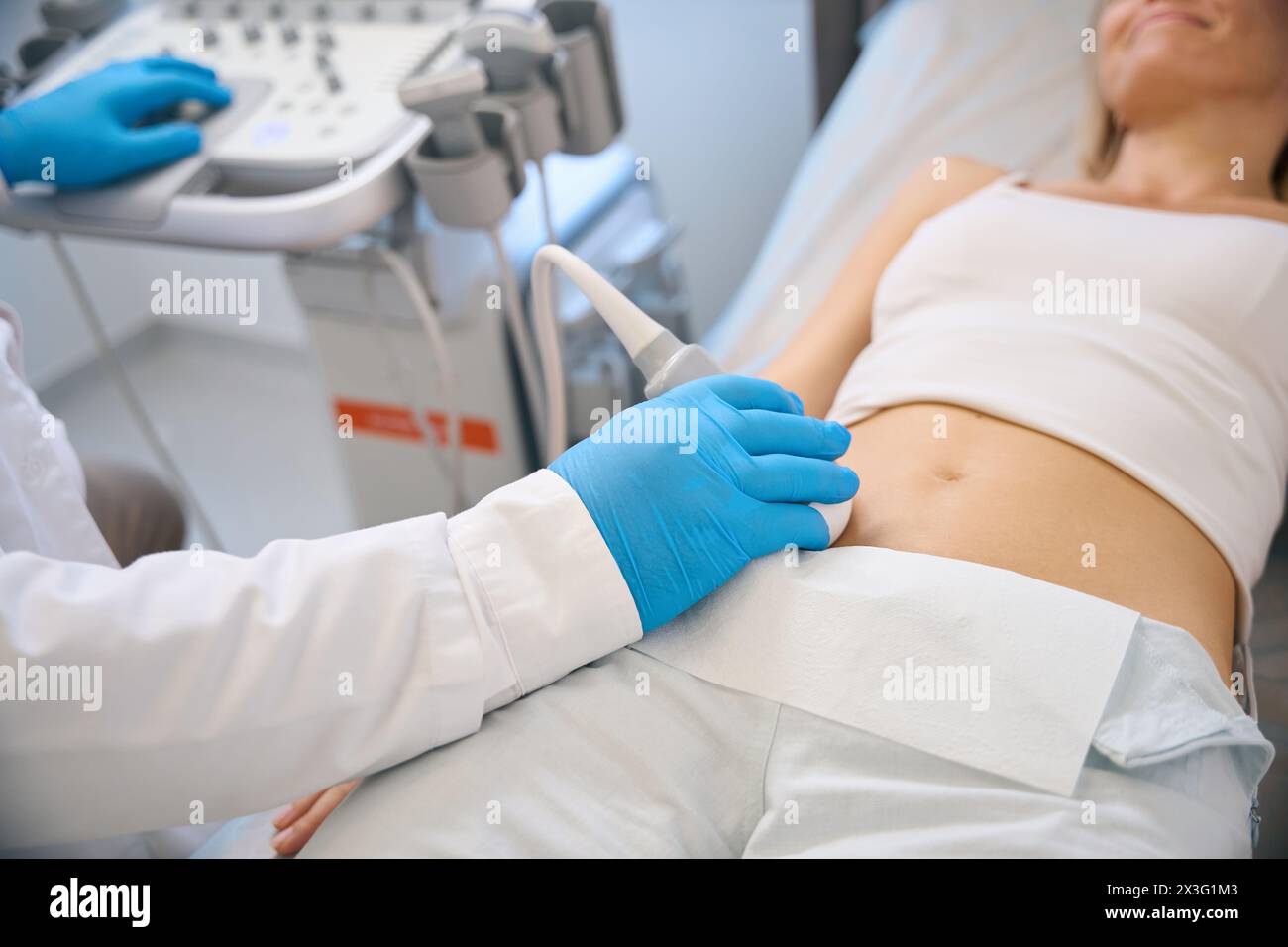 Mature woman getting ultrasound hi-res stock photography and images - Alamy