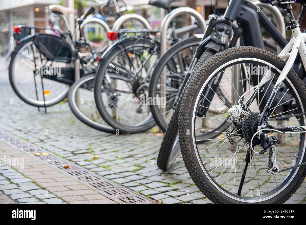 Urban streets with bikes. Bikes stay on Bicycle parking in Germany ...