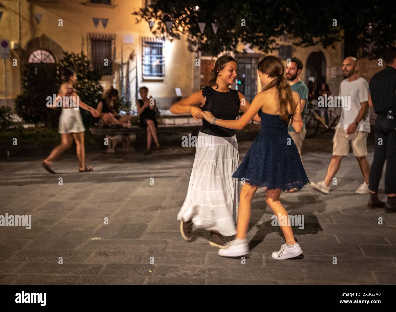 Dancing in the streets Stock Photo - Alamy