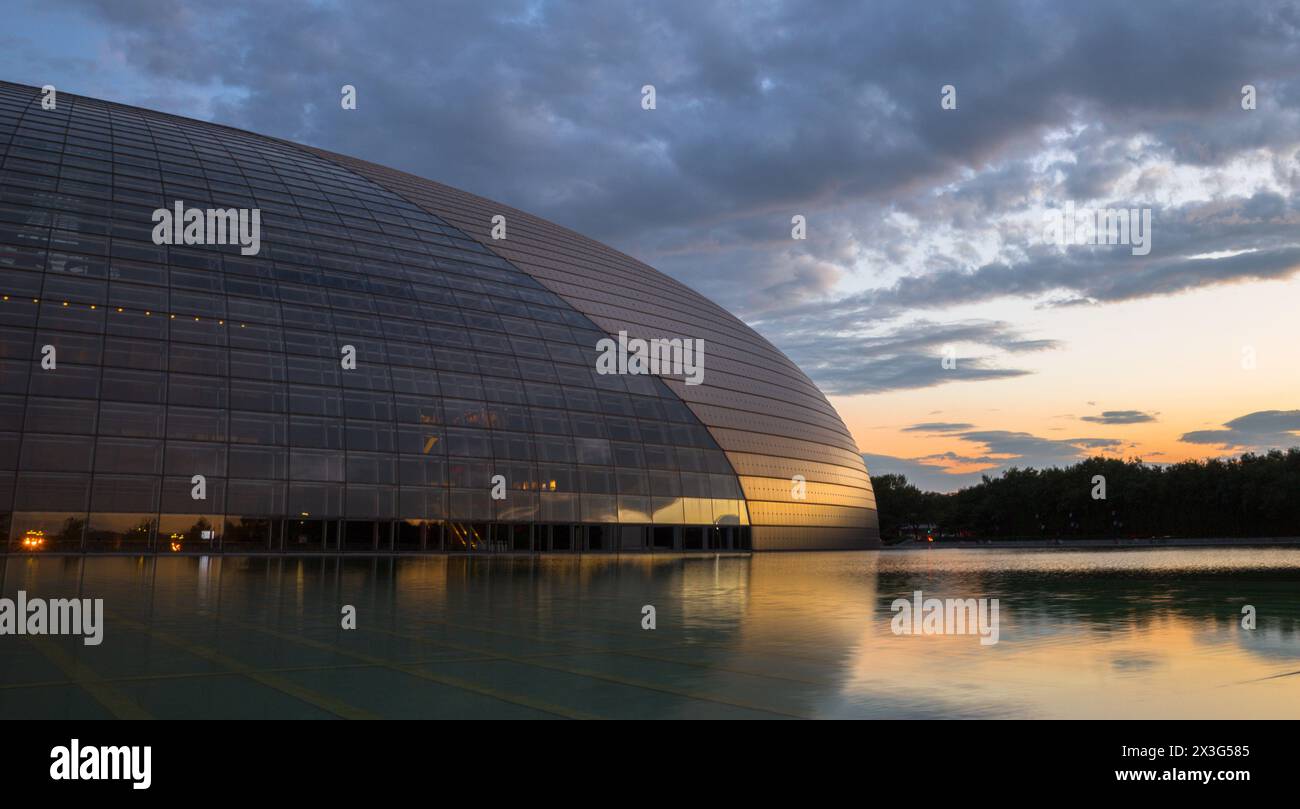 the national centre hall at sunset in Beijing, Titanium-encased, egg ...