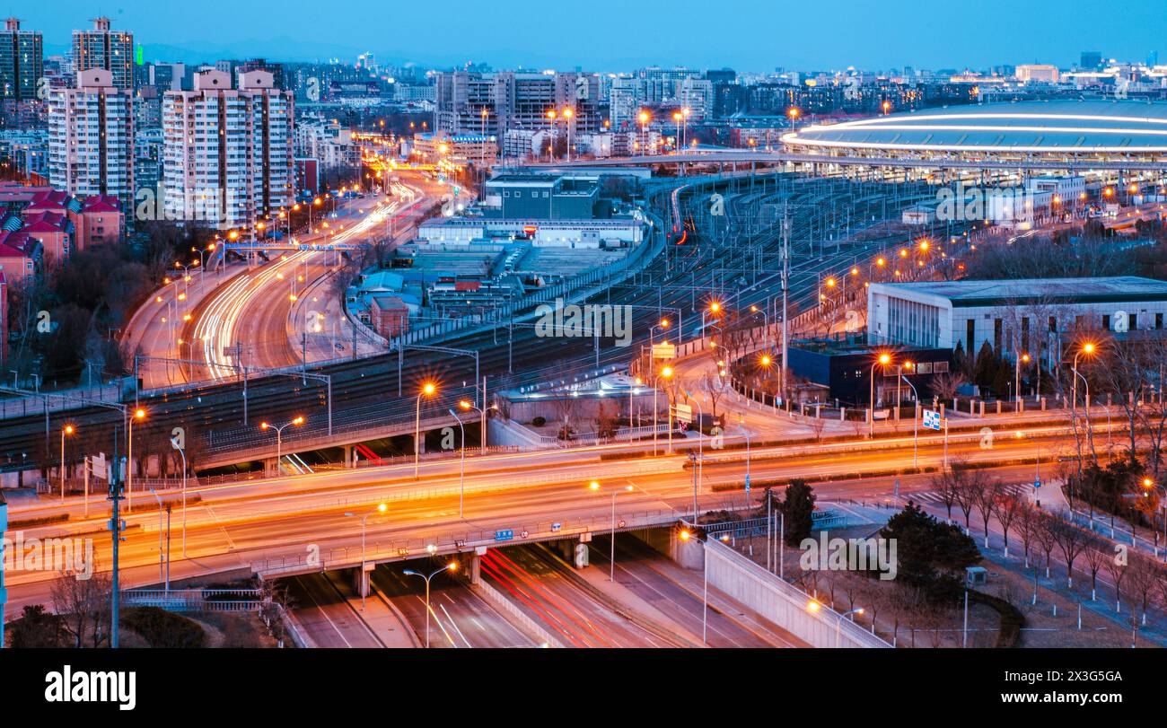 Aerial night view of Beijing South Railway Station with traffic light ...