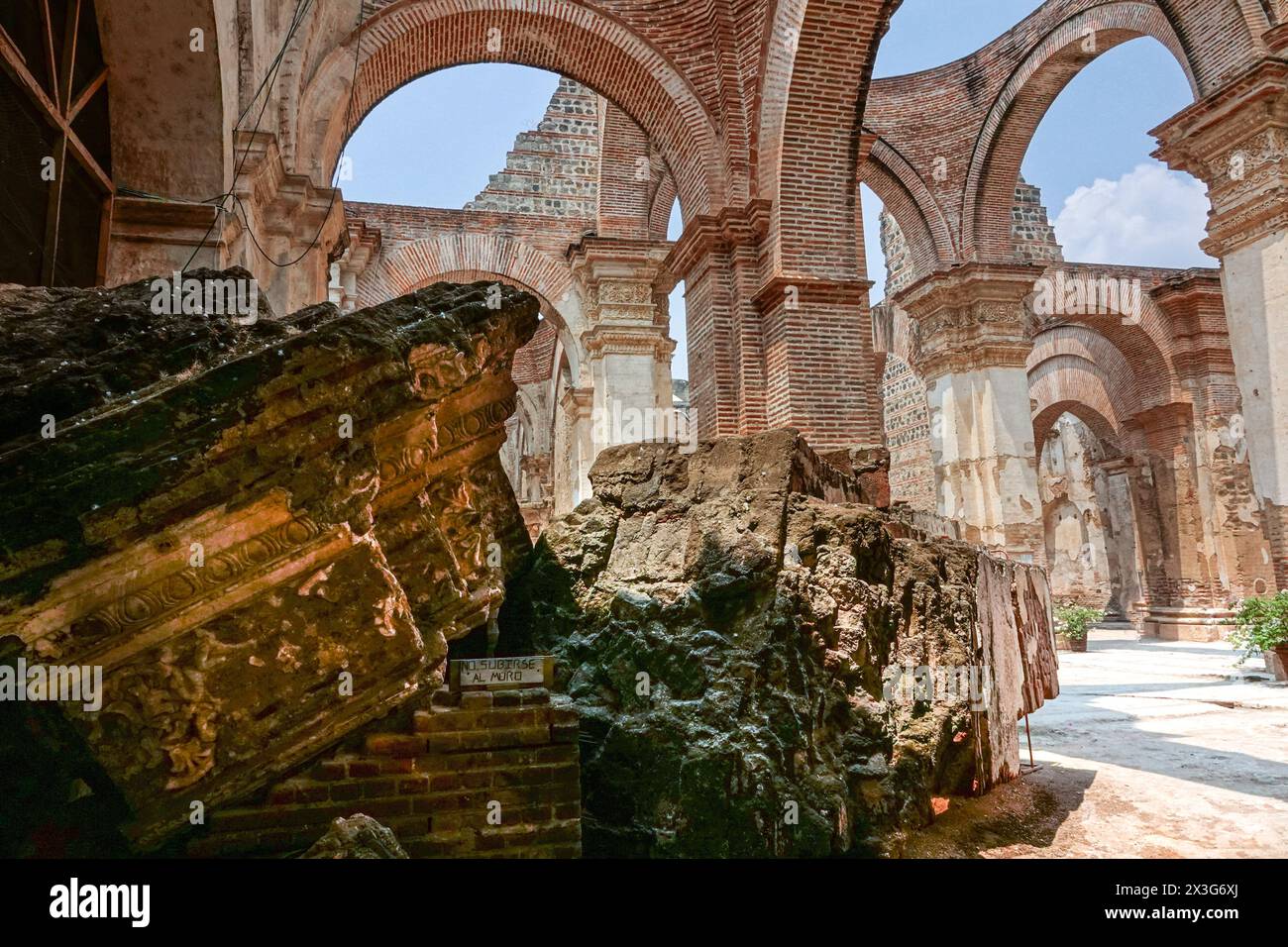 Massive stone columns, now rubble piled in the ruins of the former 15th ...