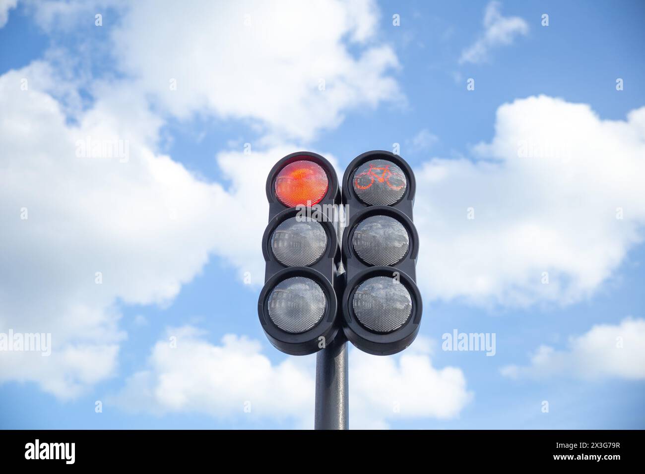 the traffic light in the background of blue sky, red light Stock Photo ...