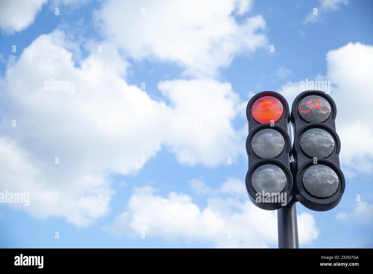 the traffic light in the background of blue sky, red light Stock Photo ...