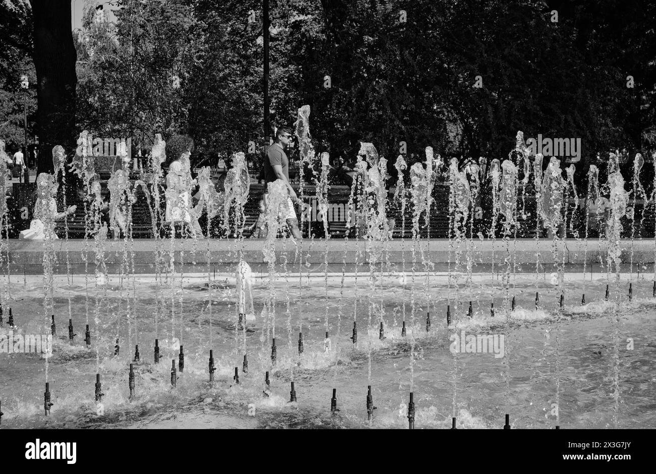 Bulgaria, Sofia; 22 September 2023, people relax by the fountain in the ...