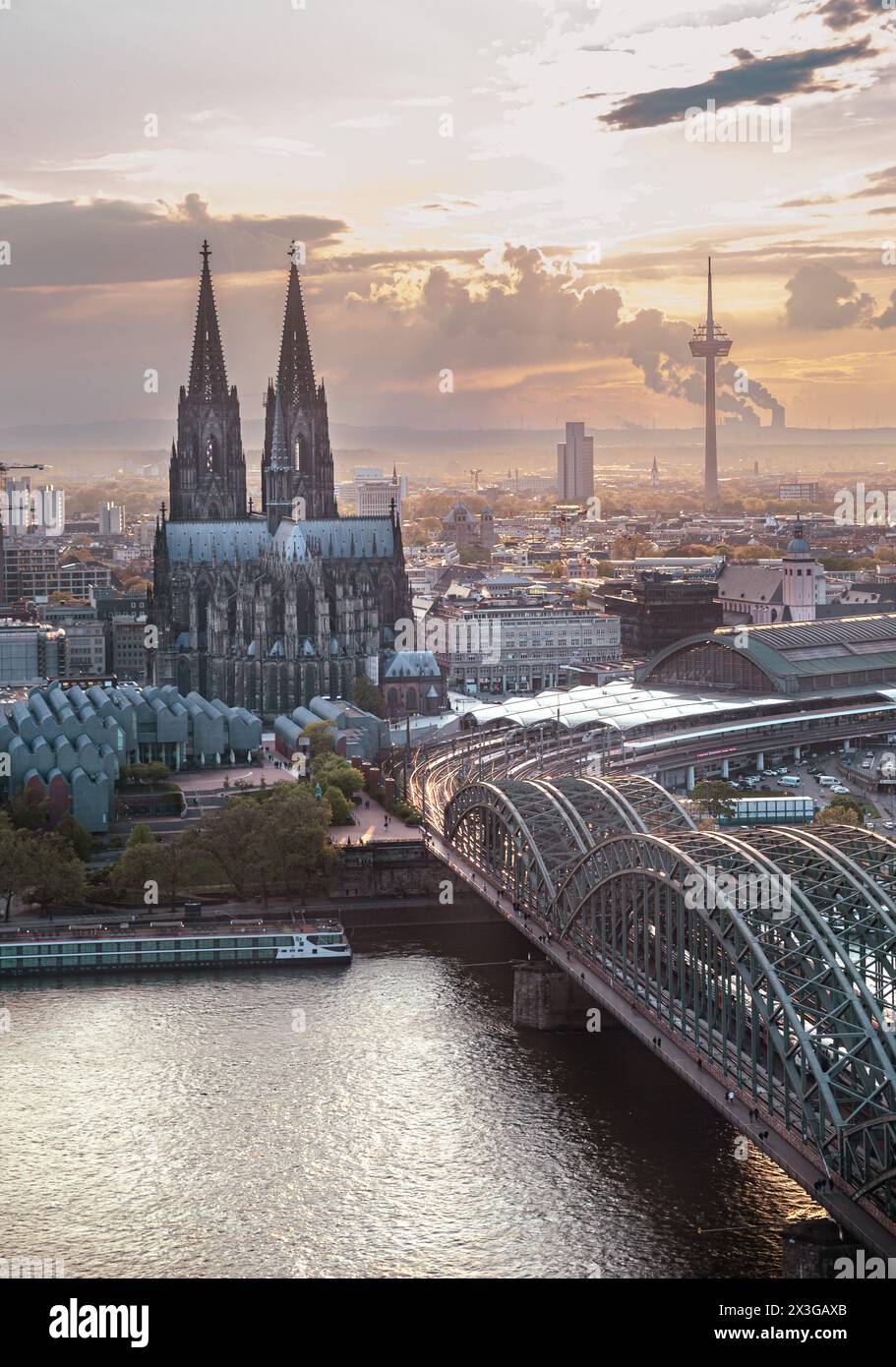 Ariel view of Cologne Cathedral and Hohenzollern Bridge at sunset ...