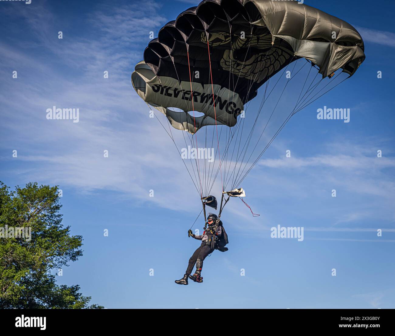 A U.S. Army parachutist from the Fort Moore Silver Wings Parachute ...
