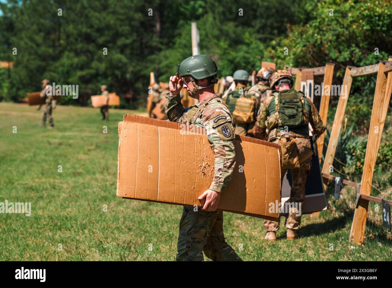 Shooters set their sights on the target during day 2 of the 33rd annual ...