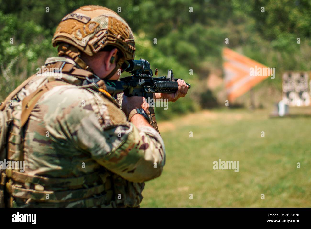Shooters set their sights on the target during day 2 of the 33rd annual ...