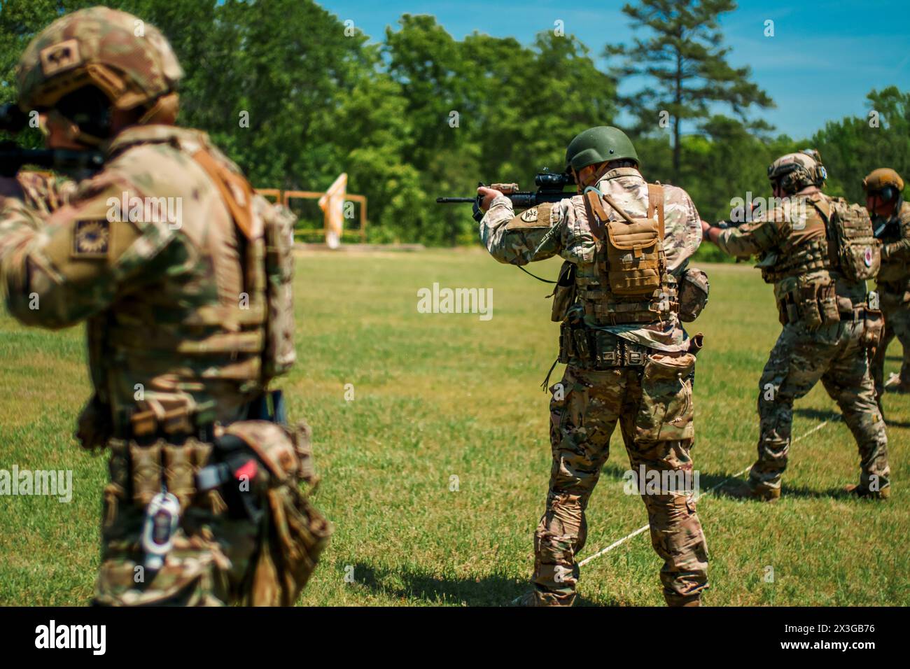 Shooters set their sights on the target during day 2 of the 33rd annual ...