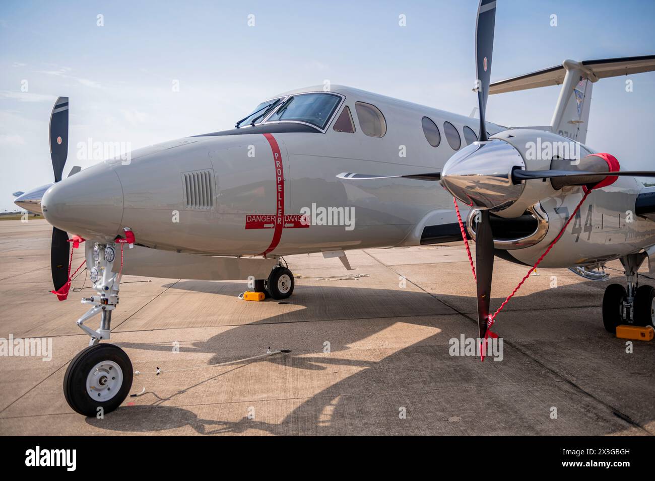 A T-54 multi-engine aircraft sits on the flightline of Naval Air ...