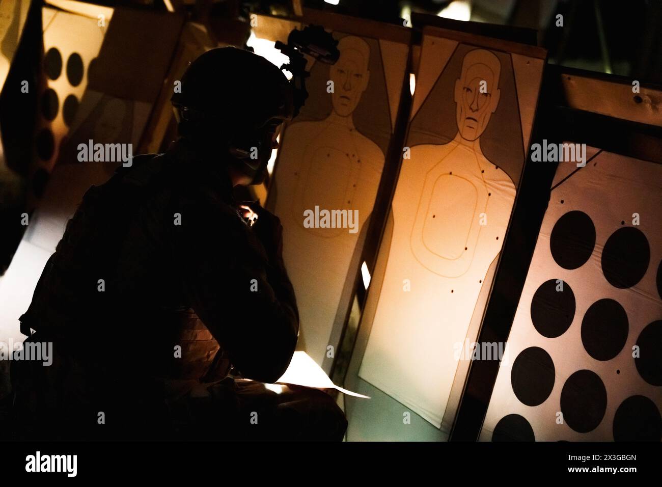 On day three, marksmen tested their skills during the first night shoot ...