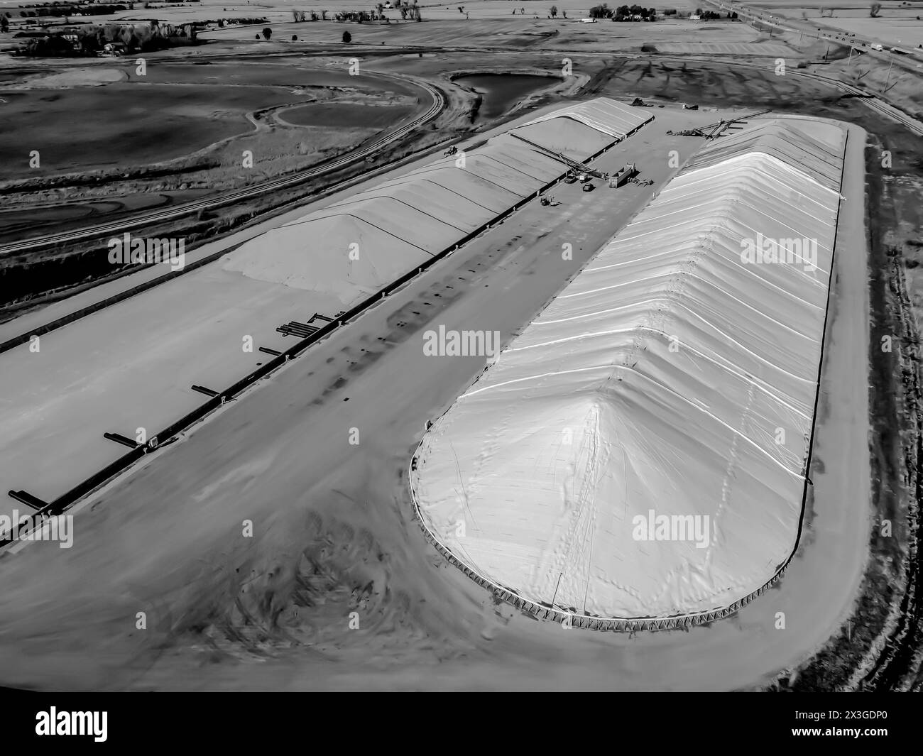 Drone view over grain storage piles being filled and covered Stock ...