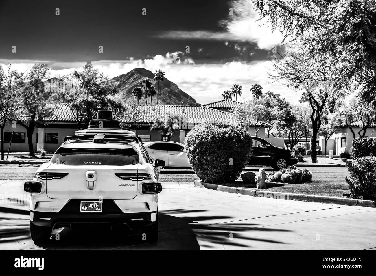 Phoenix, Arizona, USA - 3.23.2024: Behind a Waymo self-driving car ...