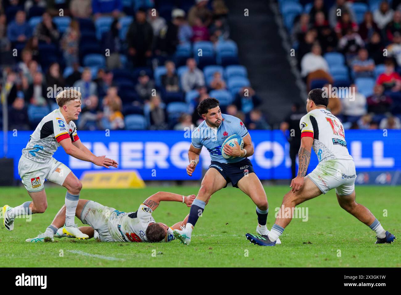 Sydney, Australia. 26th Apr, 2024. Triston Reilly (C) of the Waratahs ...
