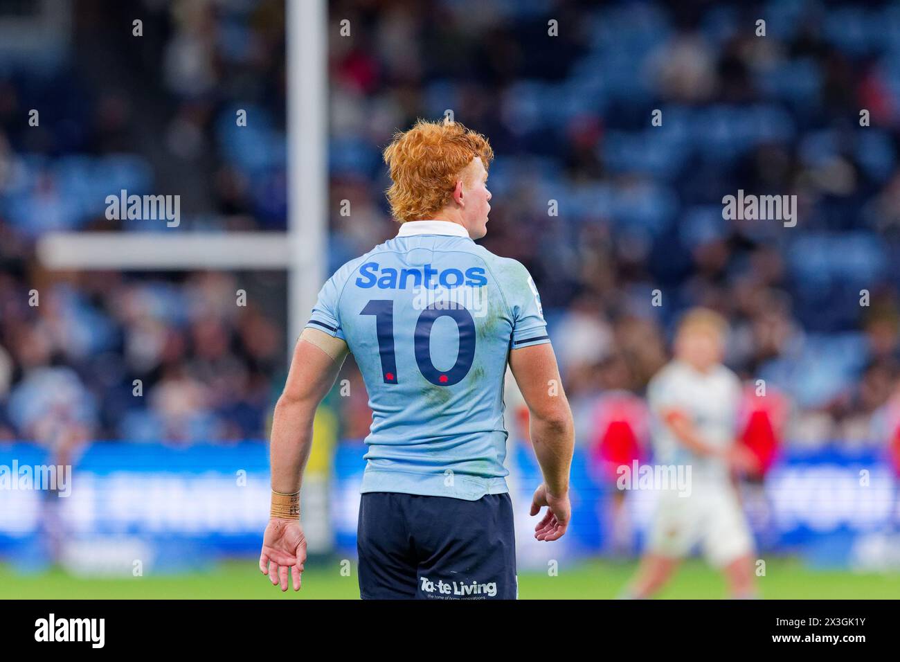 Sydney, Australia. 26th Apr, 2024. Tane Edmed of the Waratahs looks on ...