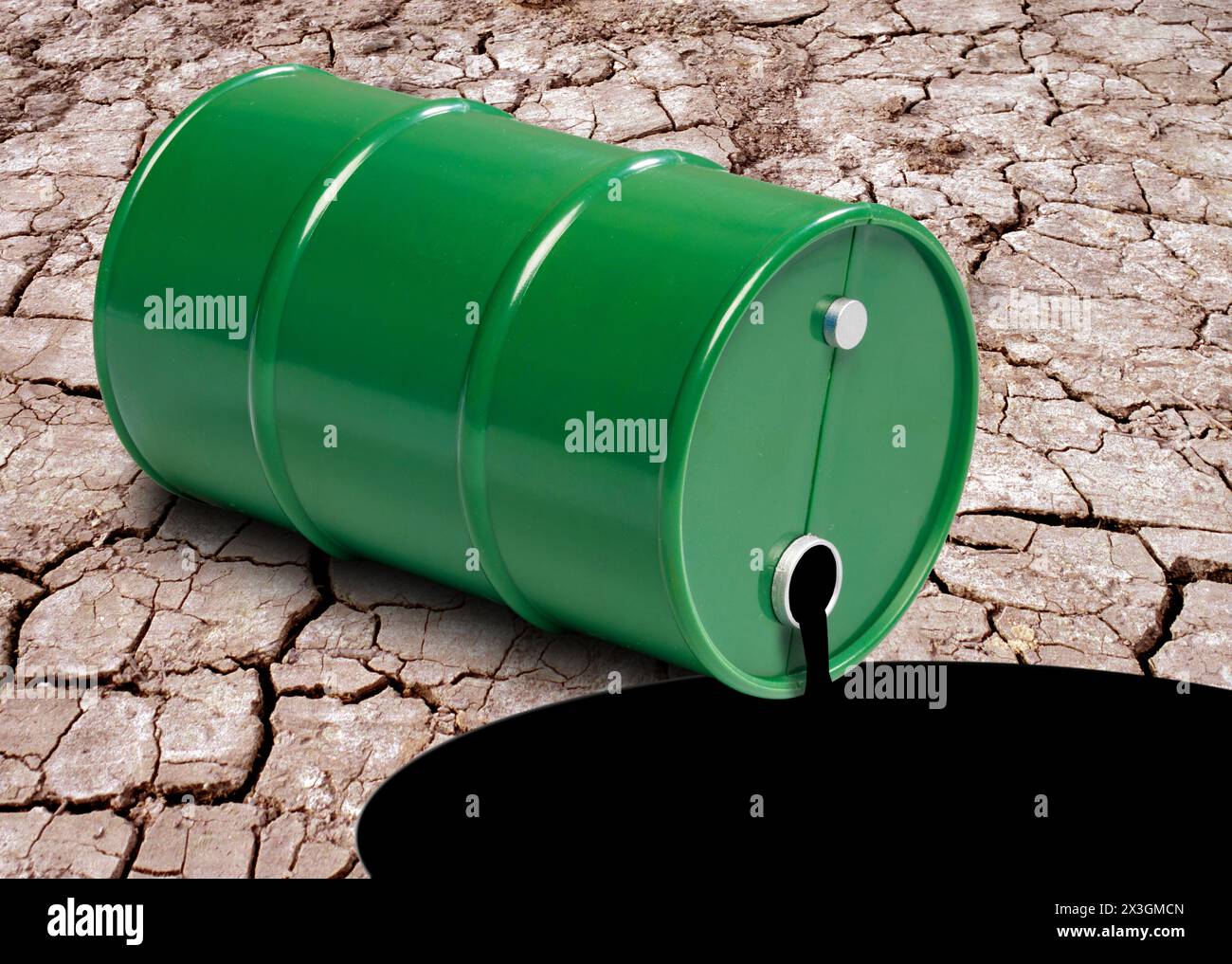 Oil spill on cracked earth hi-res stock photography and images - Alamy