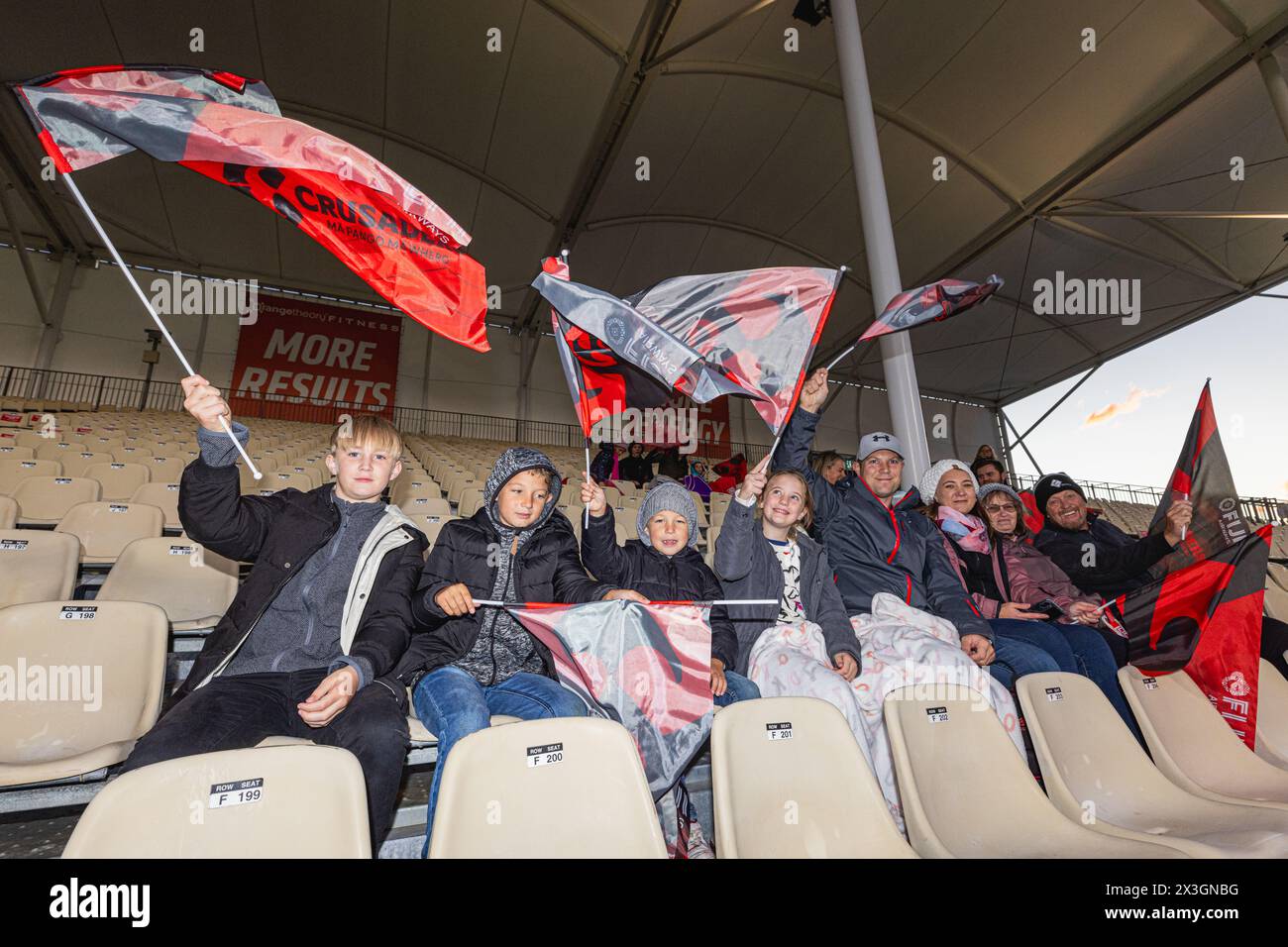 CHRISTCHURCH, NEW ZEALAND - APRIL 26: Crusaders fans pose for a photo ...