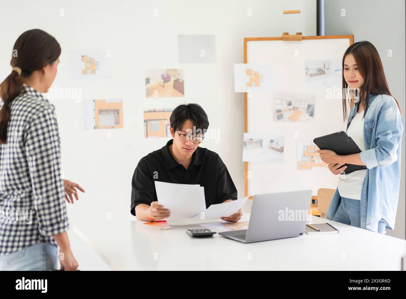 Design building concept, Male architects look house plan on blueprint ...