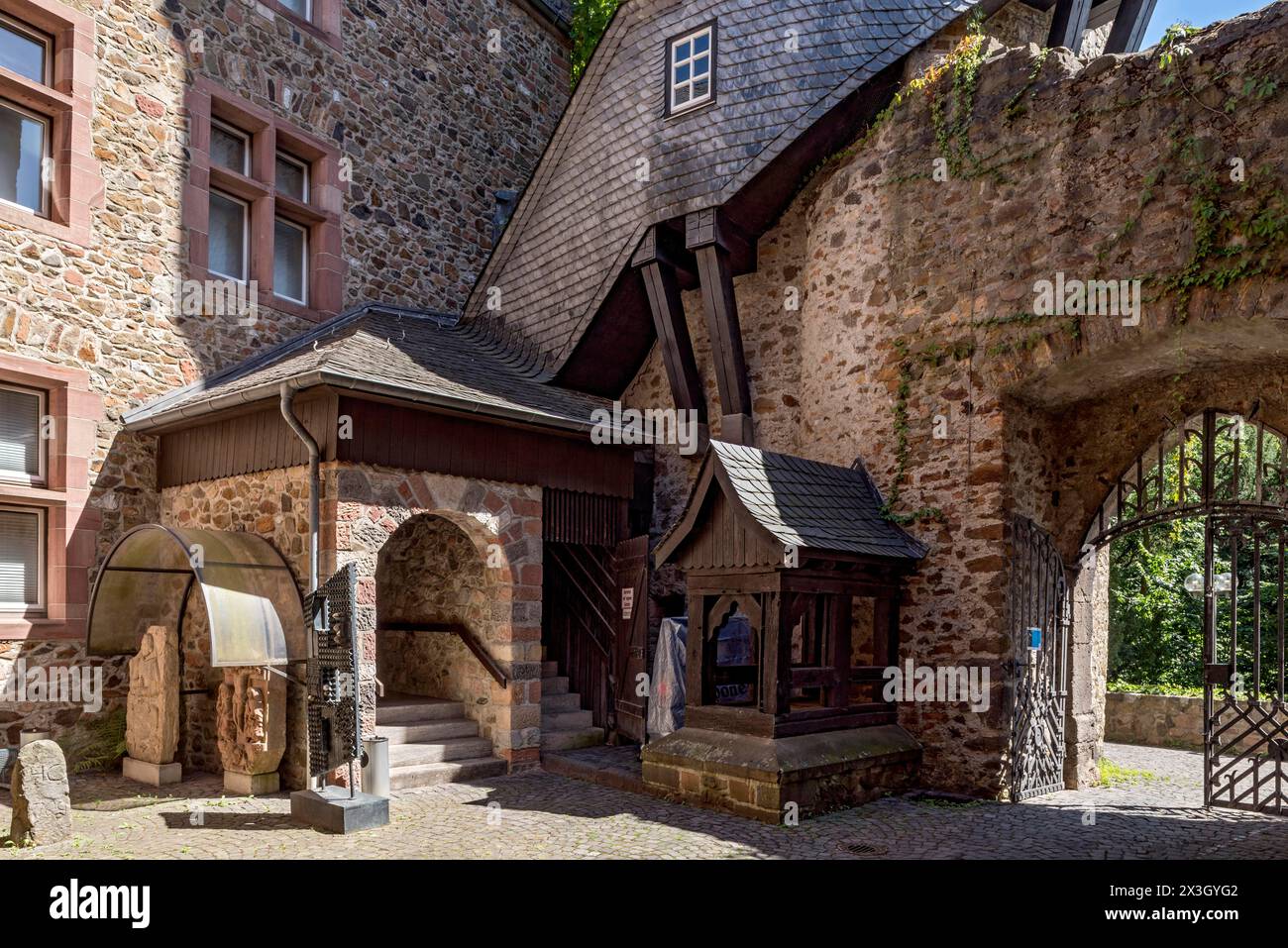 Old neo-renaissance castle, castle courtyard with fountain and stairway ...
