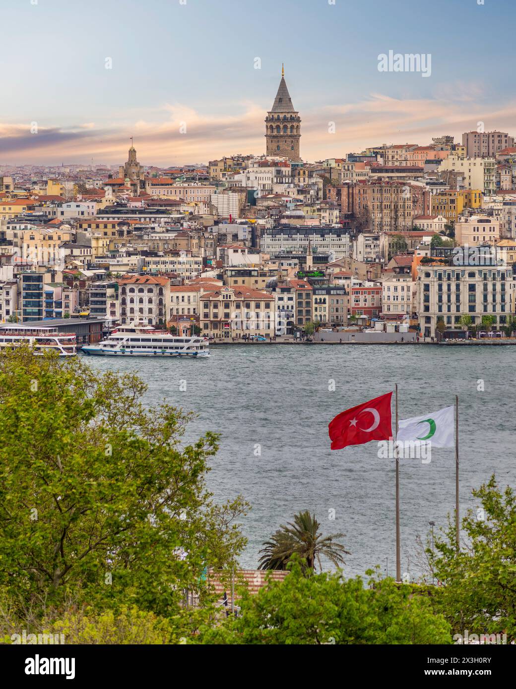 Skyline of European side of Istanbul with ferry boats sailing in ...