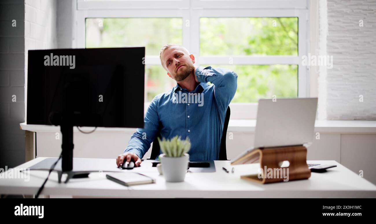 Shoulder Pain And Posture. Man Suffering Near Workstation Computer ...