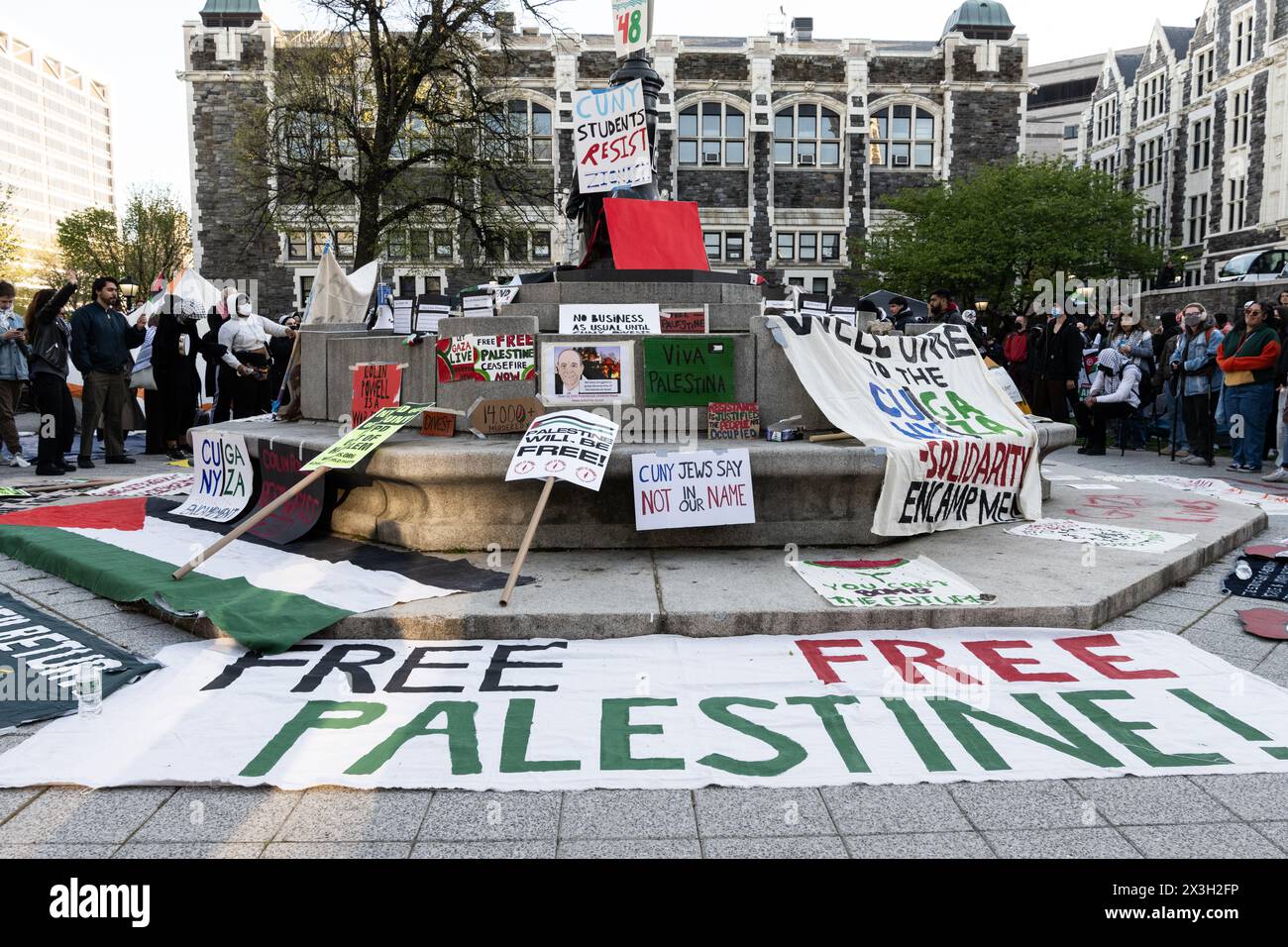 Signs at the City College of New York encampment protesting Israel's ...