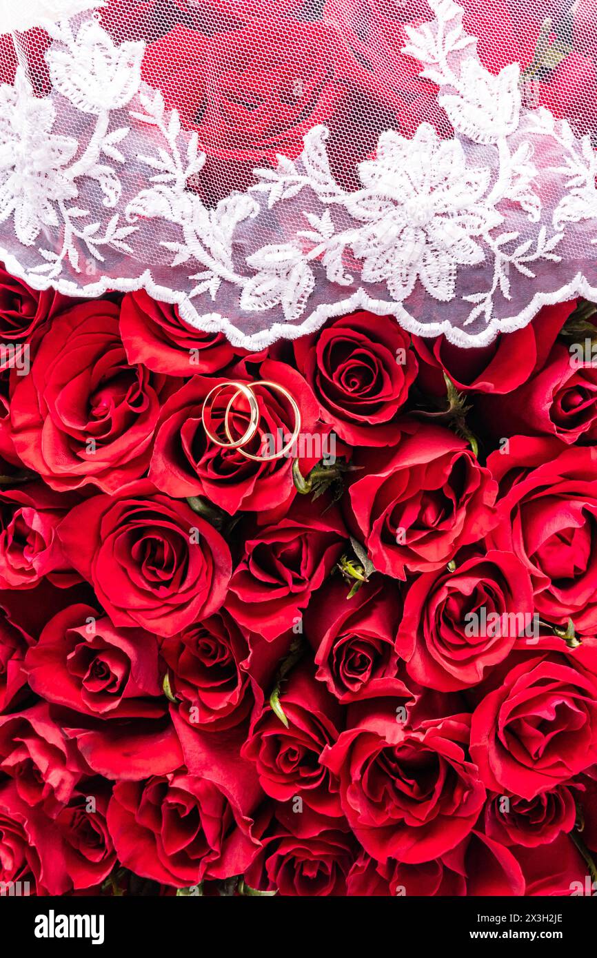 Background image for wedding design or mockup. Two gold wedding rings ...