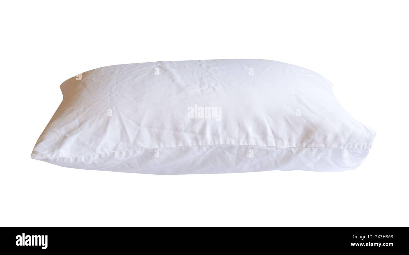 Side view of white pillow with case after guest use in hotel or resort ...