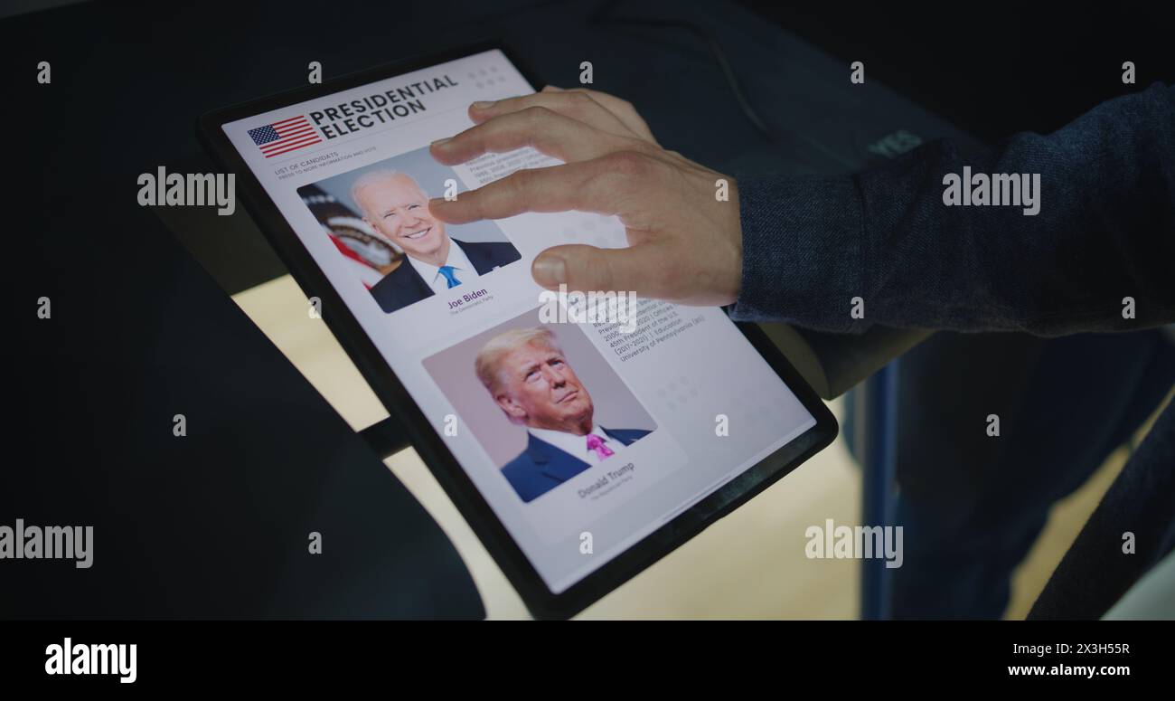 ZAPORIZHYA, UKRAINE -MARCH 15, 2024: Close up of male voter making ...