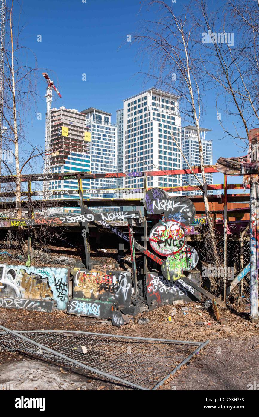Suvilahti DIY Skatepark structures in front, Kalasatama high-rise ...