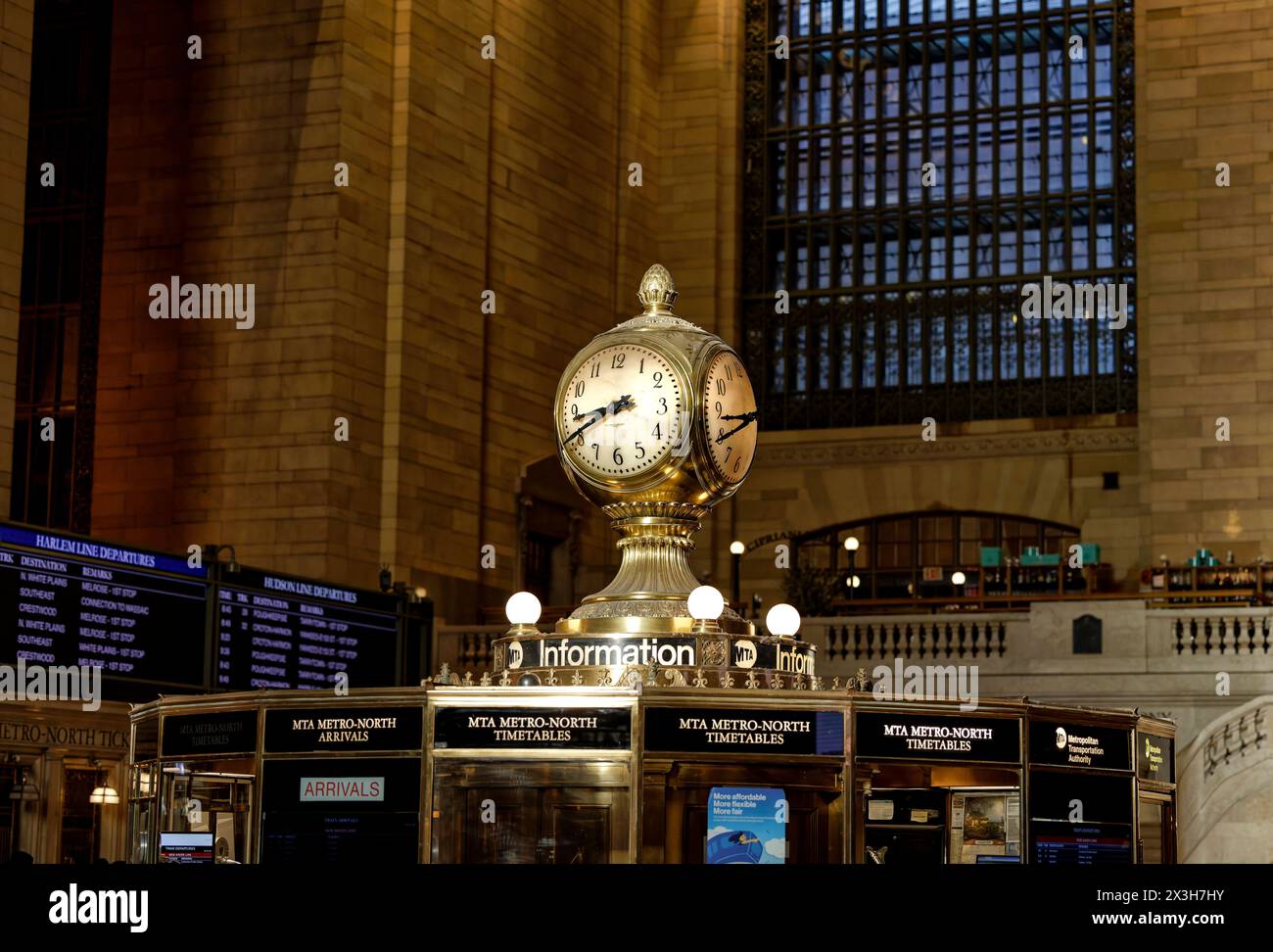 Brass clock on information booth in Grand Central Station or Terminal's ...