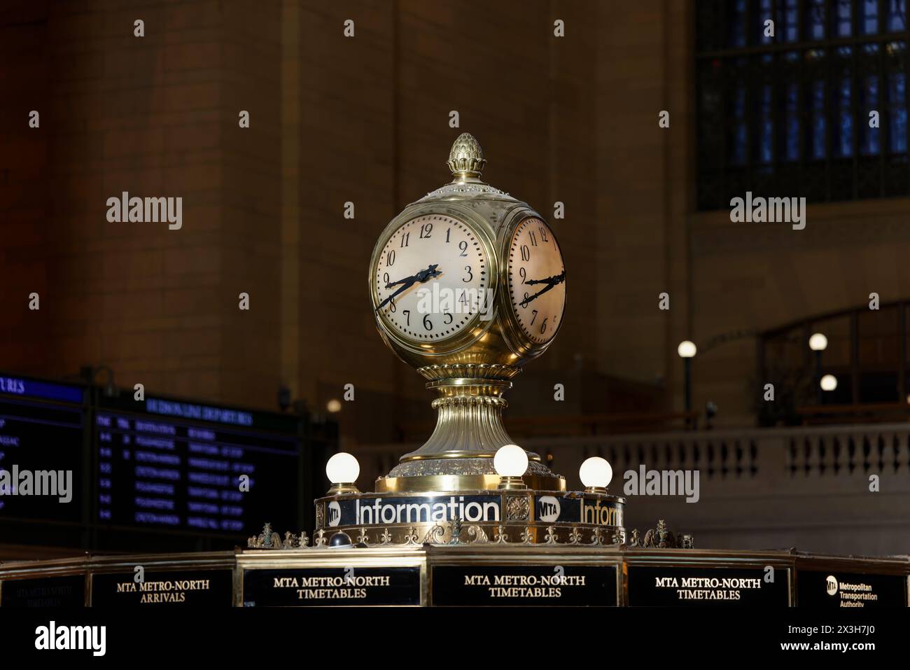 Brass clock on information booth in Grand Central Station or Terminal's ...