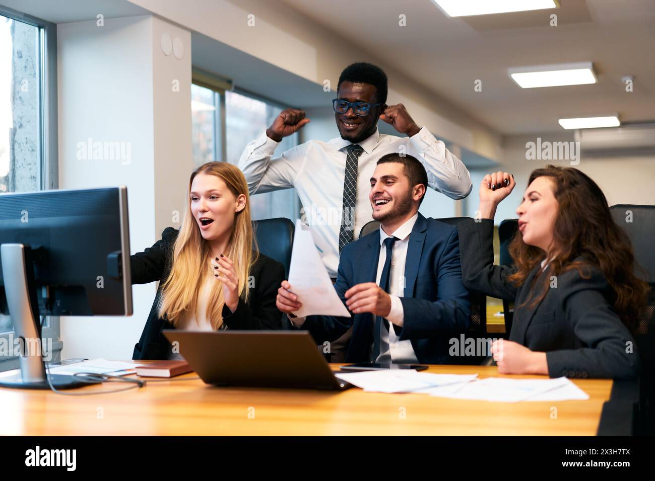 Team celebrates successful project hi-res stock photography and images ...