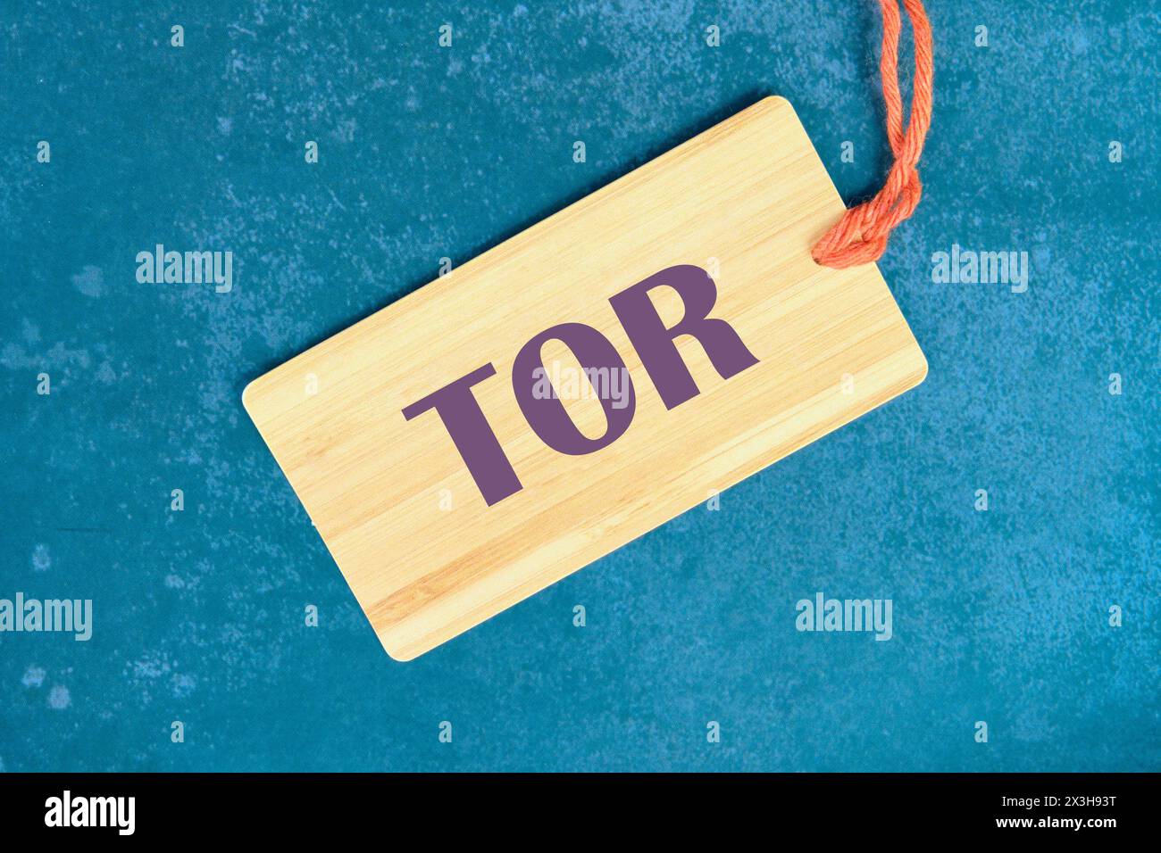 TOR Terms Of Reference on the card on an abstract background Stock ...