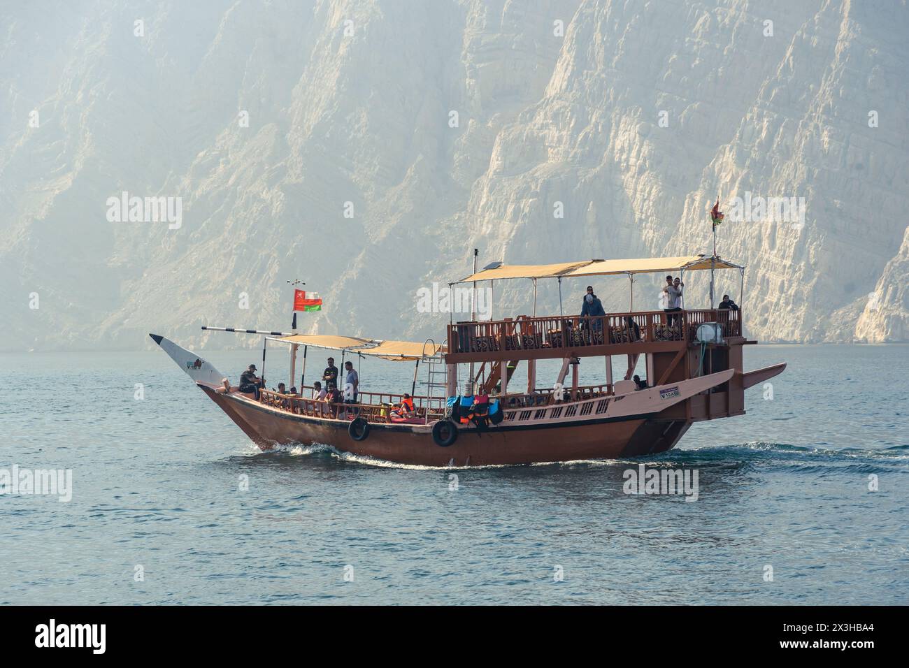 Khasab, Oman - 1 January 2024: A traditional Omani dhow sails ...