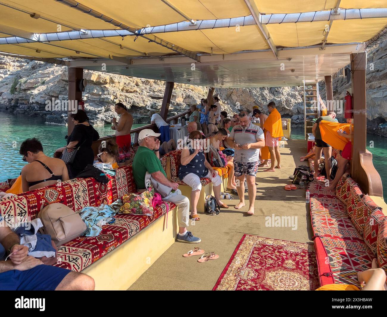 Khasab, Oman - 1 January 2024: A group of tourists embark on an ...