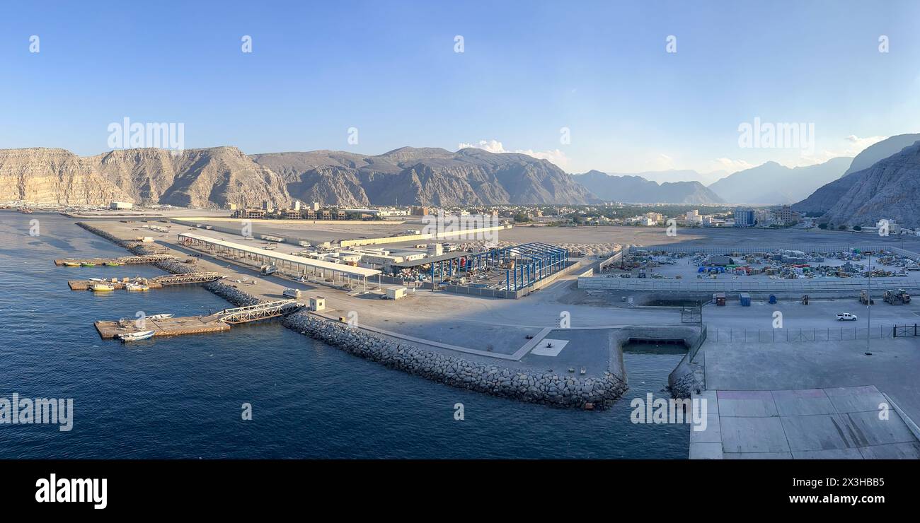 Khasab, Oman - 1 January 2024: The golden hour sun casts a warm glow ...