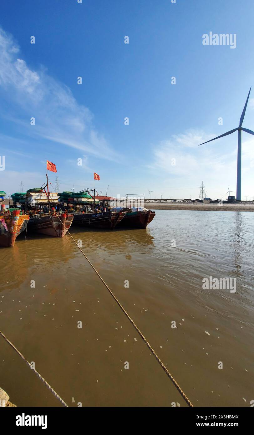 A couple of boats are seen peacefully floating in the calm water Large ...