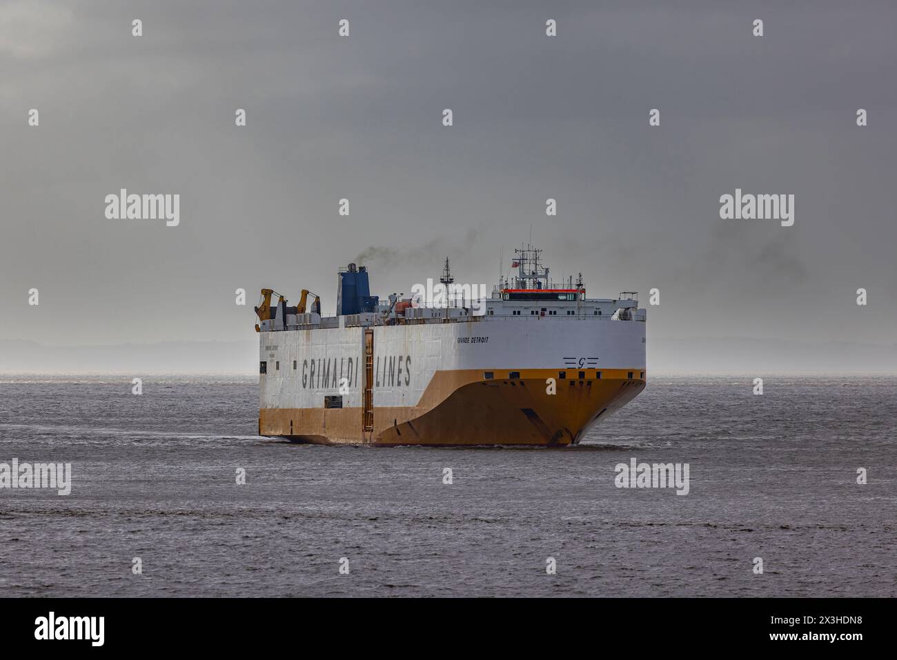 An overcast afternoon a RoRo heading for port Stock Photo - Alamy