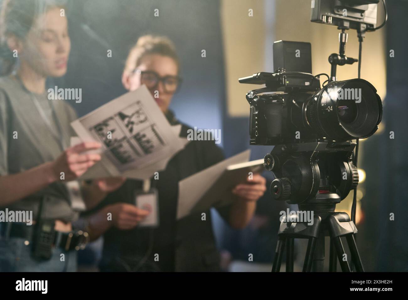 Professional digital video camera on stand at production studio or ...